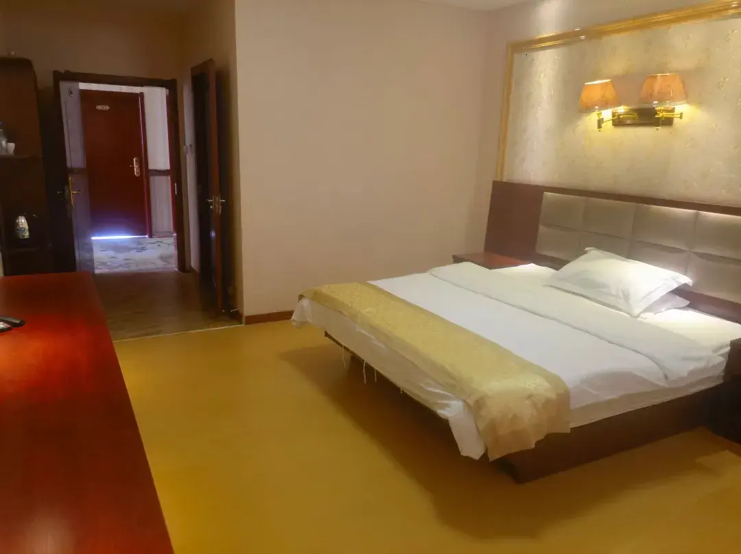 Barry New Hexin Hotel - Hami