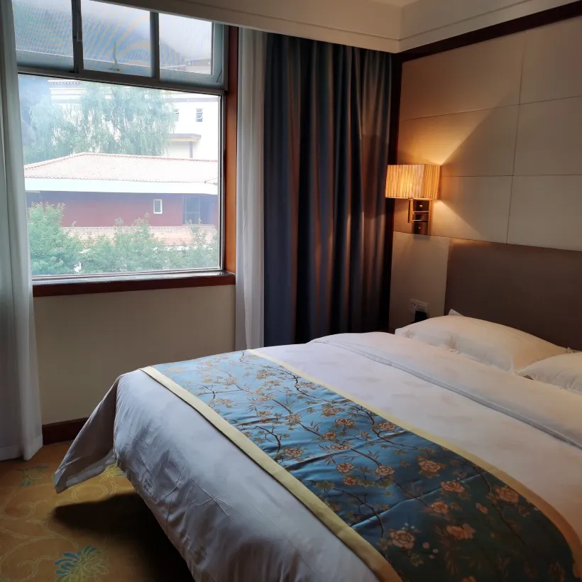 شاهد 176 صورة لفندق Poly New Jiuzhai Hotel | Trip.com