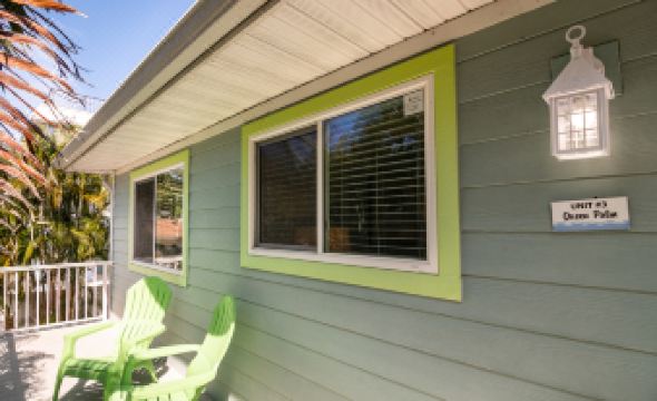 Heated Pool and Cozy Living Area - Charming Coastal Haven, Holmes Beach ...