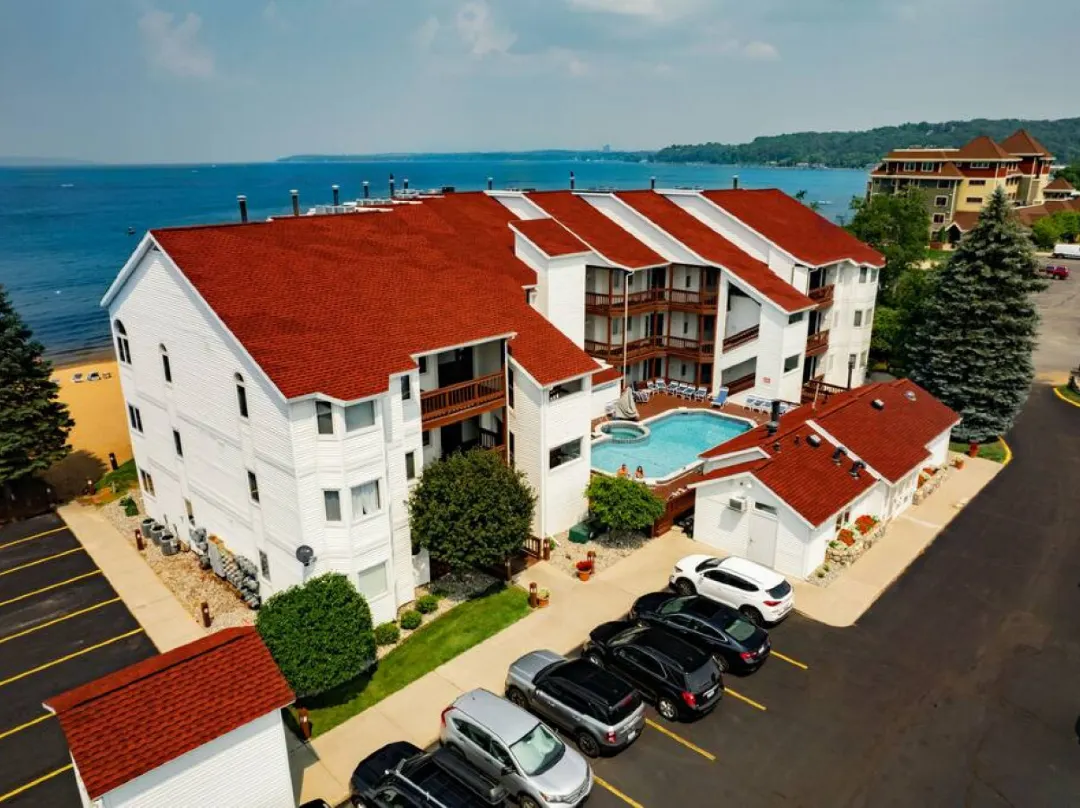 Waterfront Haven 215|balcony|direct Beach Access|near Downtown - Elk Rapids, MI