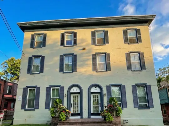 Exposed Brick And Modern Kitchen Amenities - Charming Historic Retreat - Wilmington, DE