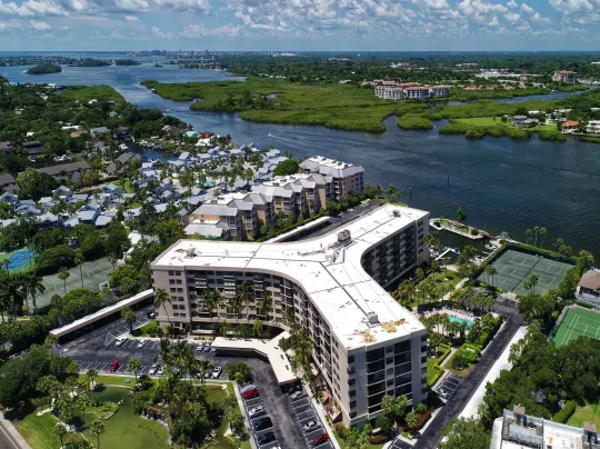 Expansive Pools And Lush Garden Surroundings - Elegant Oasis - Sarasota, FL