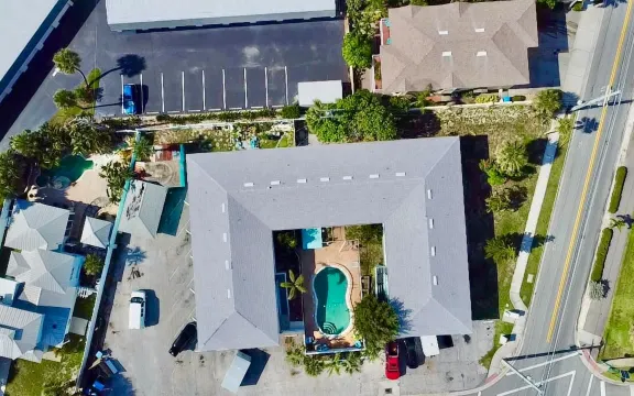 Community Pool And Modern Amenities - Charming Beachside Retreat - Cape Canaveral, FL