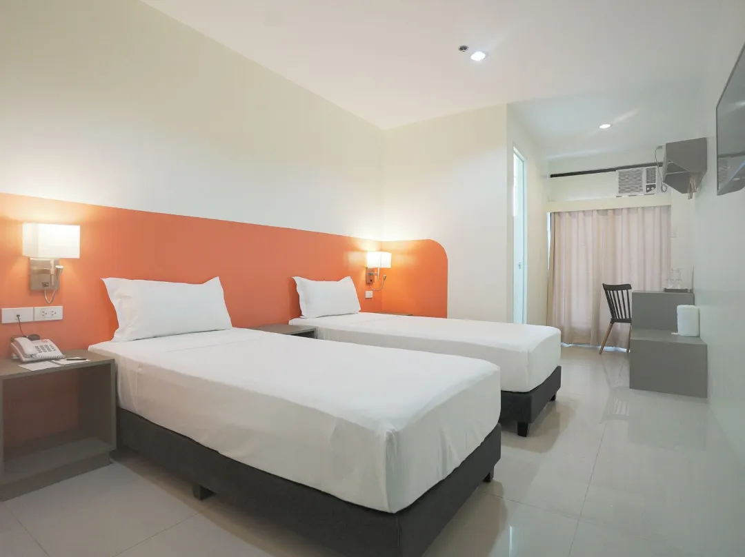 Travelbee Airport Inn - 曼達維市