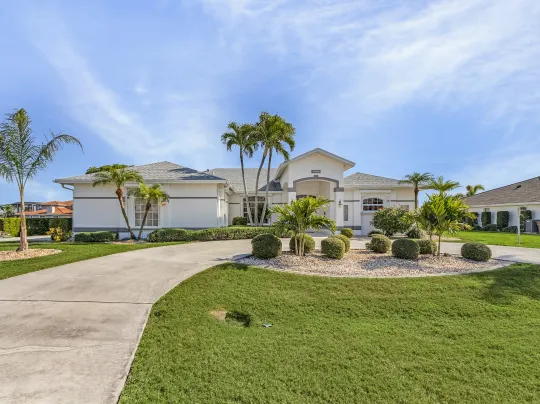 Heated Pool With Waterfall And Tiki Dock - Stunning Tropical Oasis - Cape Coral, FL
