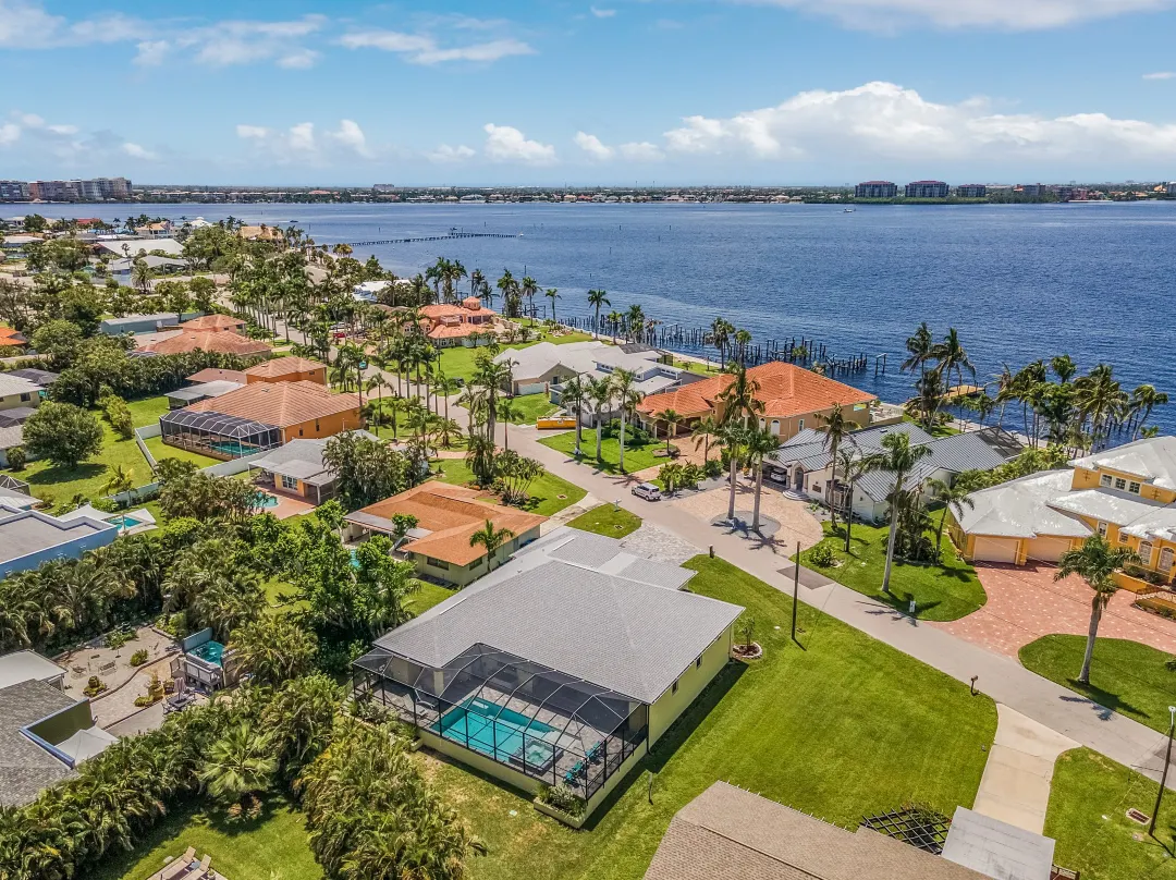 Glistening Pool, Spa And Outdoor Kitchen - Charming Coastal Retreat - Cape Coral, FL