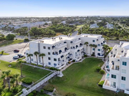 Chic Coastal Retreat With Patio And Pool Access - Stunning Modern Oasis - Cape Canaveral, FL
