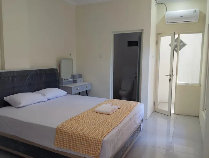 Grand Karunia Homestay - スラバヤ