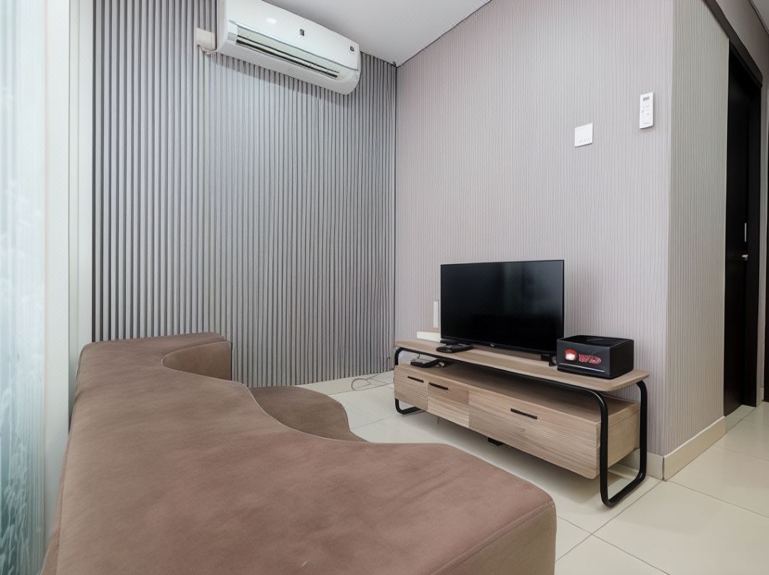 Simply Clean And Cozy 1br With Sofabed At Atlanta Residence Apartment - Depok