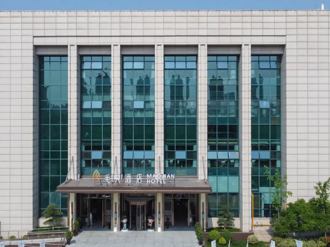 Xinyang Maojian Hotel - Xinyang
