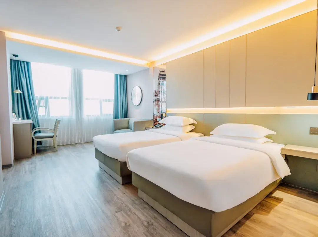 Xuecheng Wanda Plaza Zaozhuang West Station Up Huayi Collection Hotel - Zaozhuang