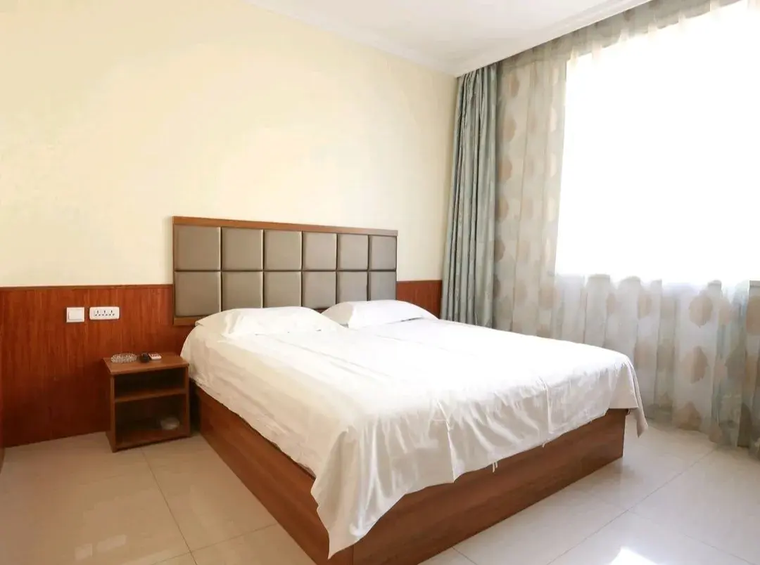 Qian Guoxin Dingsheng Hotel - Songyuan