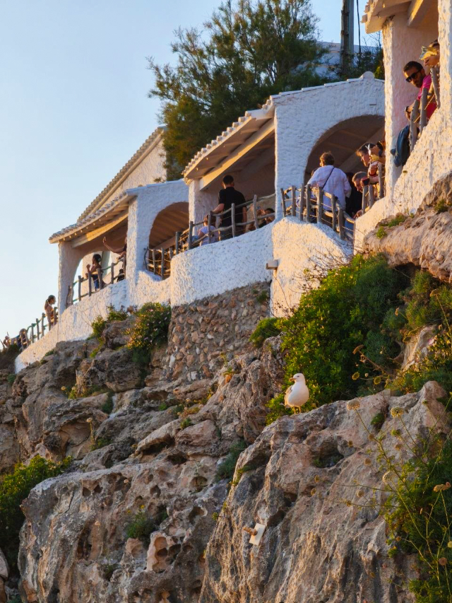 Cova d'en Xoroi: A Bar Carved Into the Cliff Face | Trip.com Cala en Porter