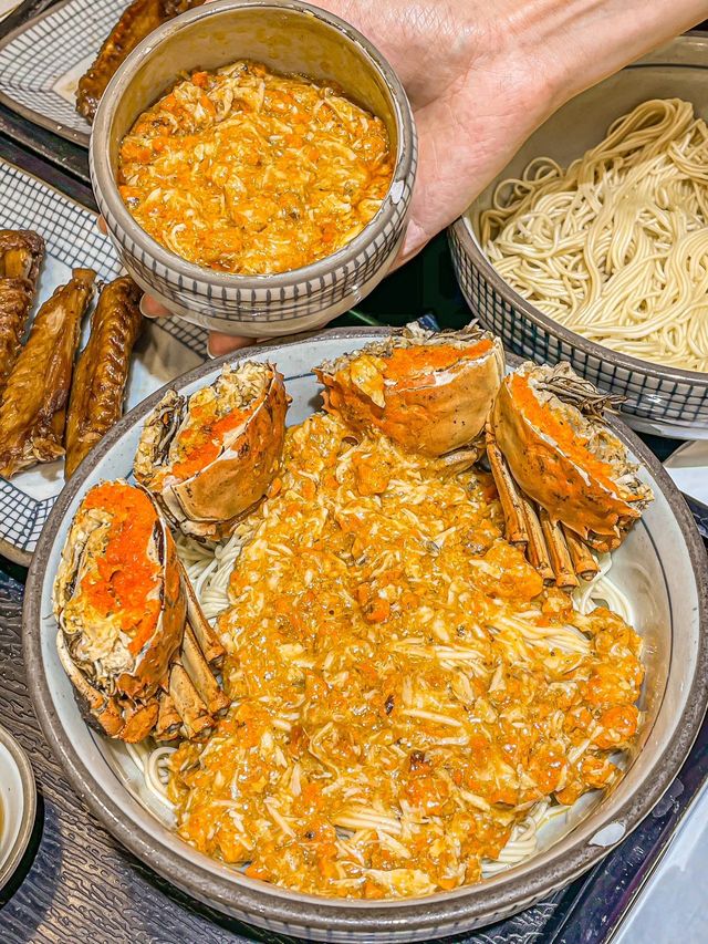 This bowl of crab roe noodles is absolutely top-notch! It's so ...