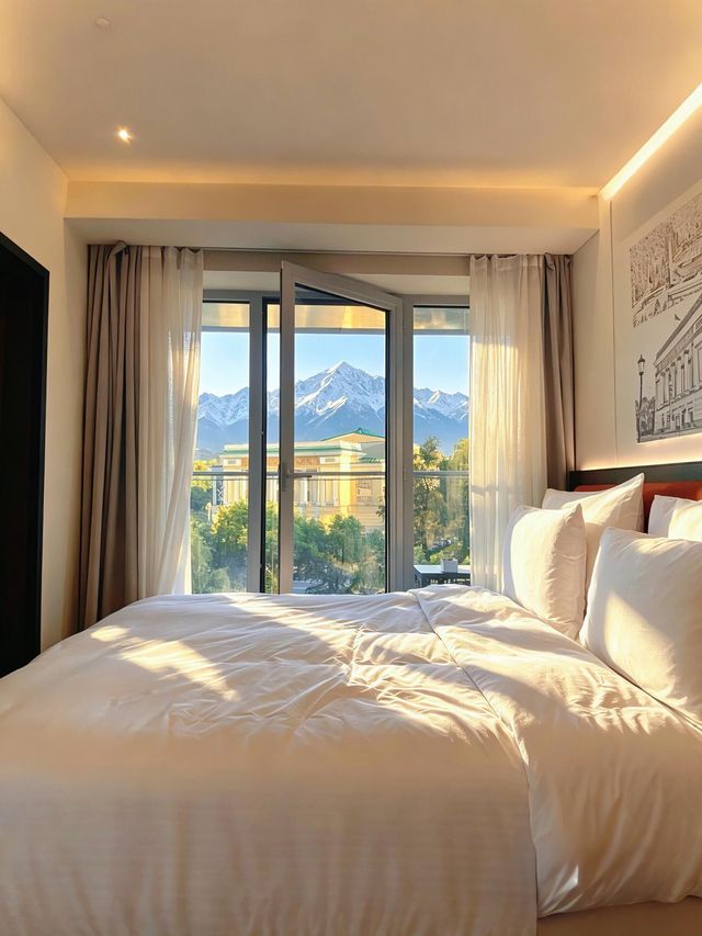 Almaty facing the snow-capped mountains! I stay at this hotel every ...