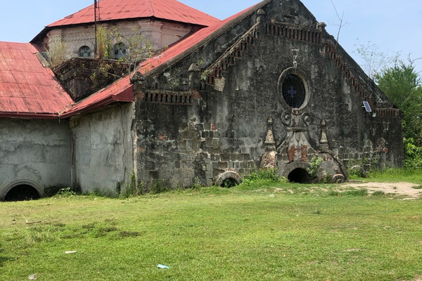 The Half Buried Church in Pampanga | Trip.com Bacolor
