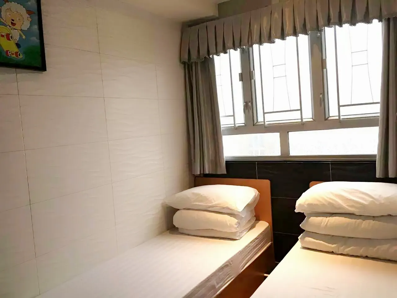 57 รูปภาพของWing Sing Hong Guesthouseจากผู้เข้าพักจริง | Trip.com